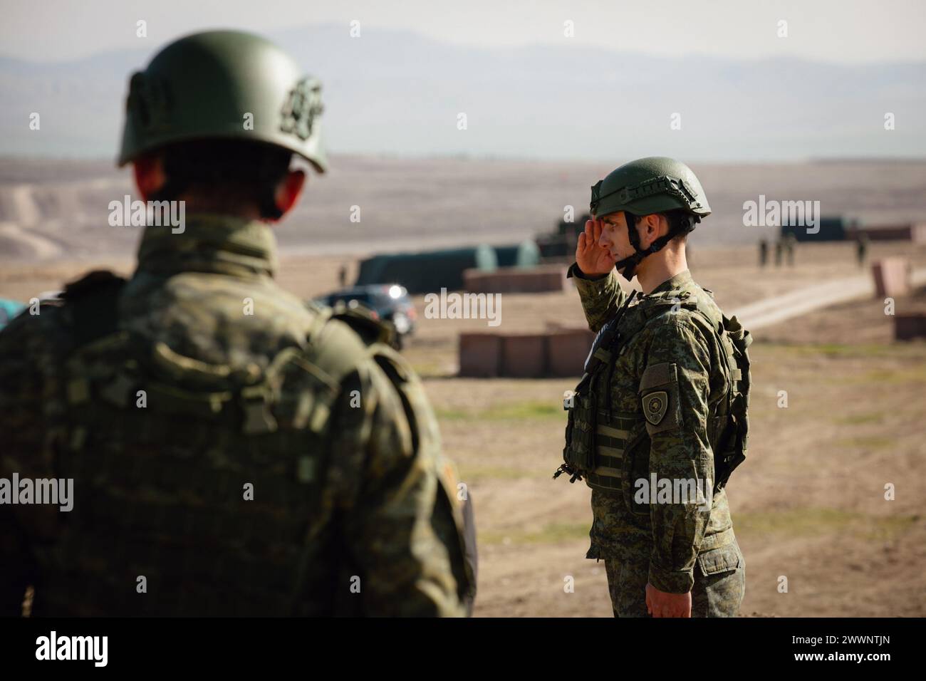 A Kosovo Security Force member salutes Distinguished Visitors during ...