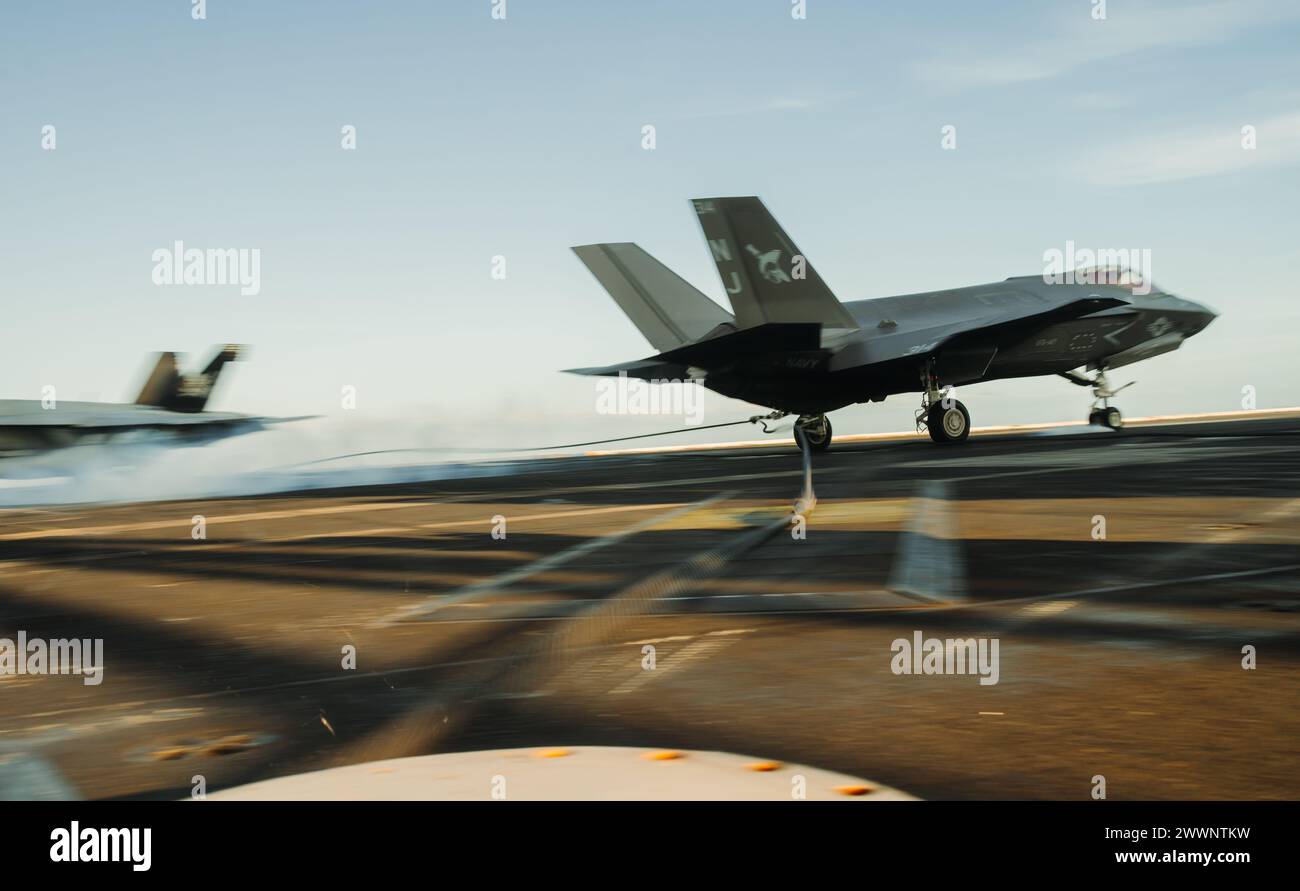 An F-35C Lightning II attached to Strike Fighter Squadron (VFA) 147 lands on Nimitz-class ...