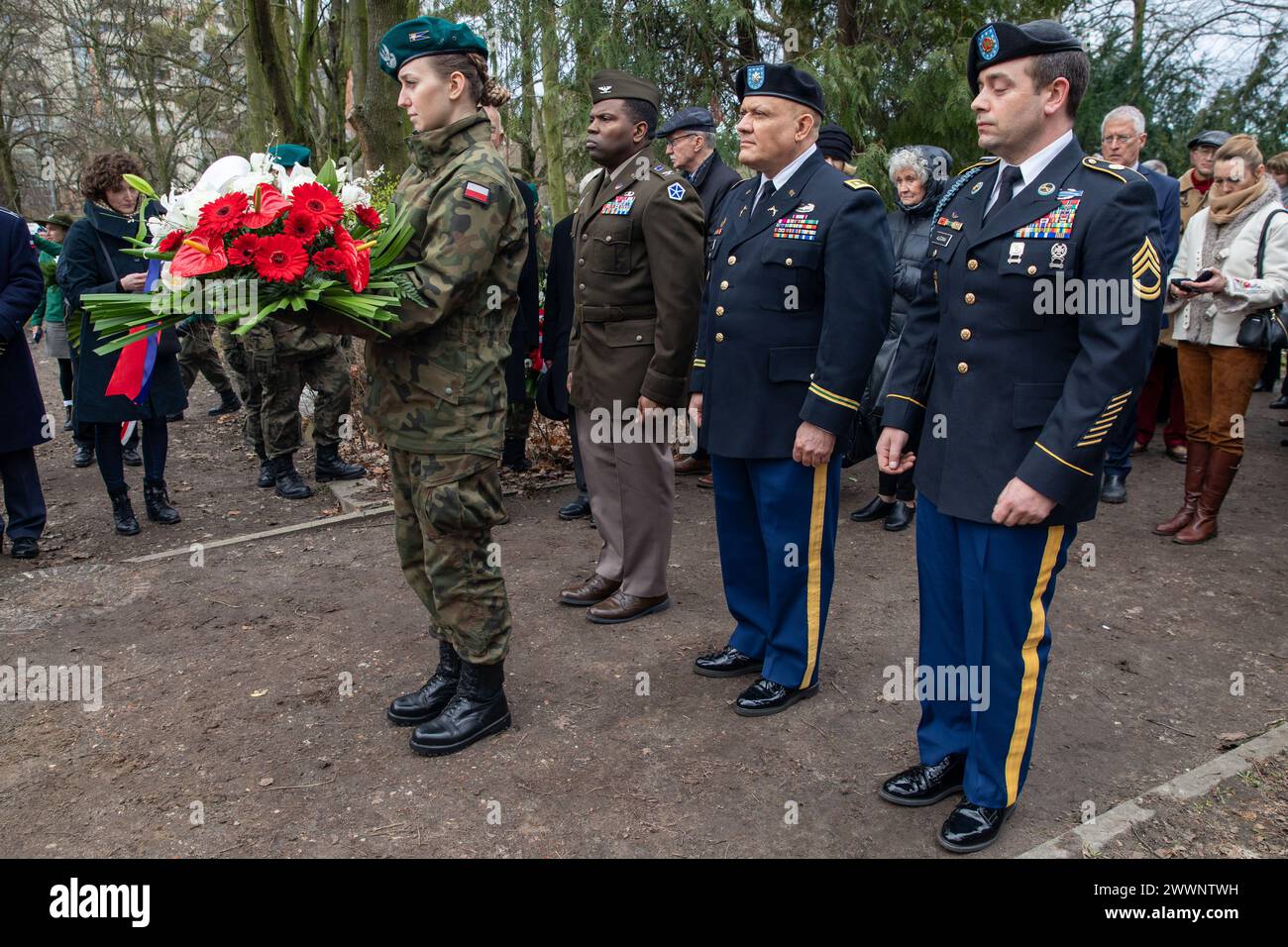 Polish armed forces and U.S. Army prepare to take part in a ceremony at ...