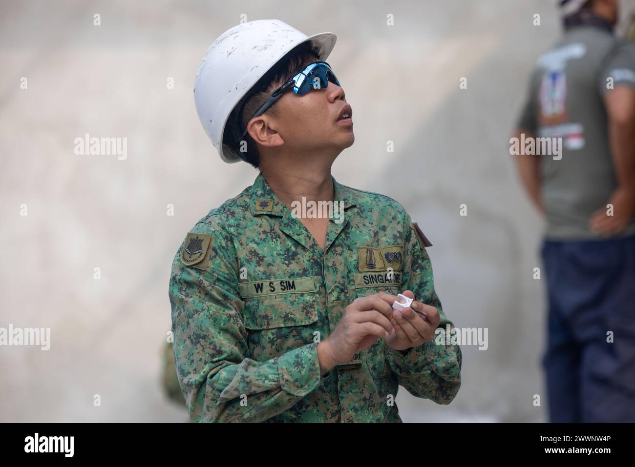 A member of 30th Battalion, Singapore Combat Engineers observes ...