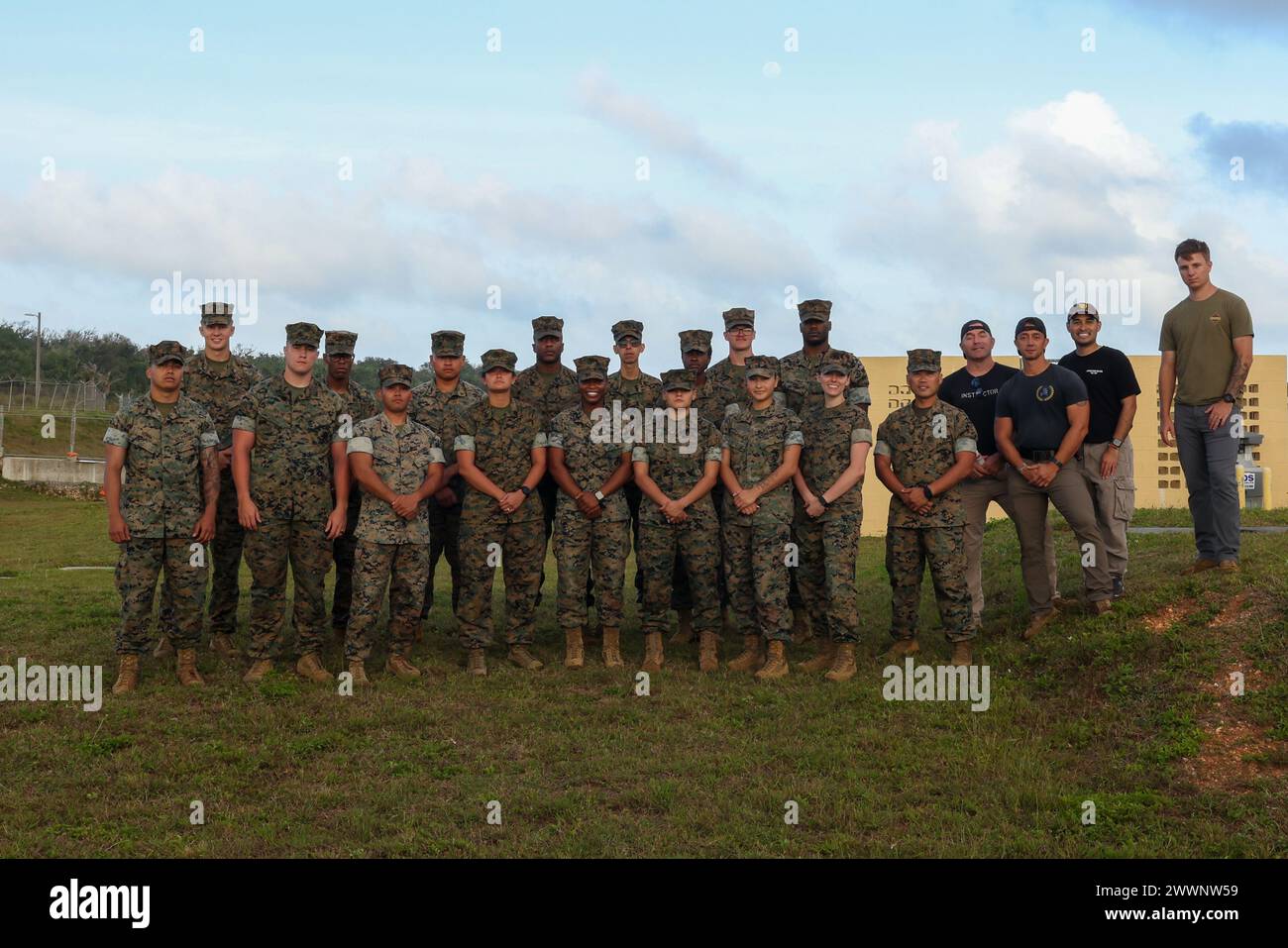 U.S. Marines stationed on Marine Corps Base (MCB) Camp Blaz pose for a ...