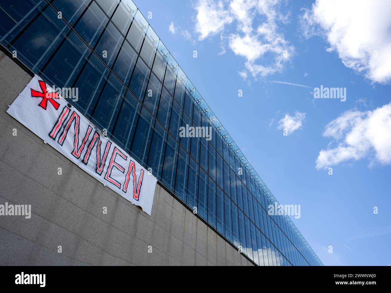 Munich, Germany. 25th Mar, 2024. A poster with the inscription "*Innen ...