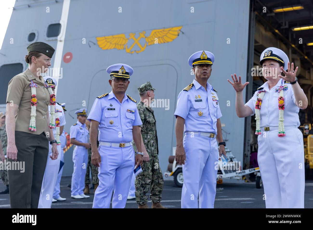 U.S. Navy Capt. Michel Brandt, right, commanding officer of the ...