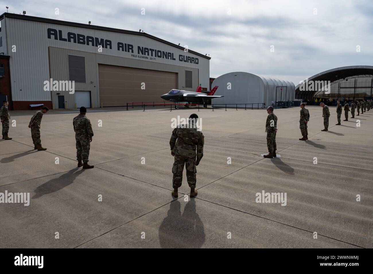 U.S. Air Force Airmen from the 187th Fighter Wing stand in a formation ...