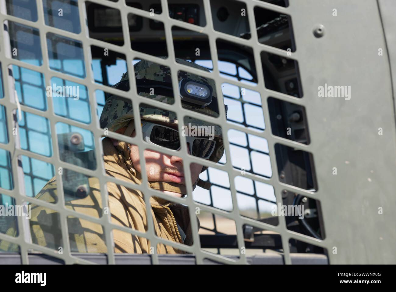 U.S. Navy Equipment Operator 2nd Class Shane Fugatt, with Naval Mobile ...