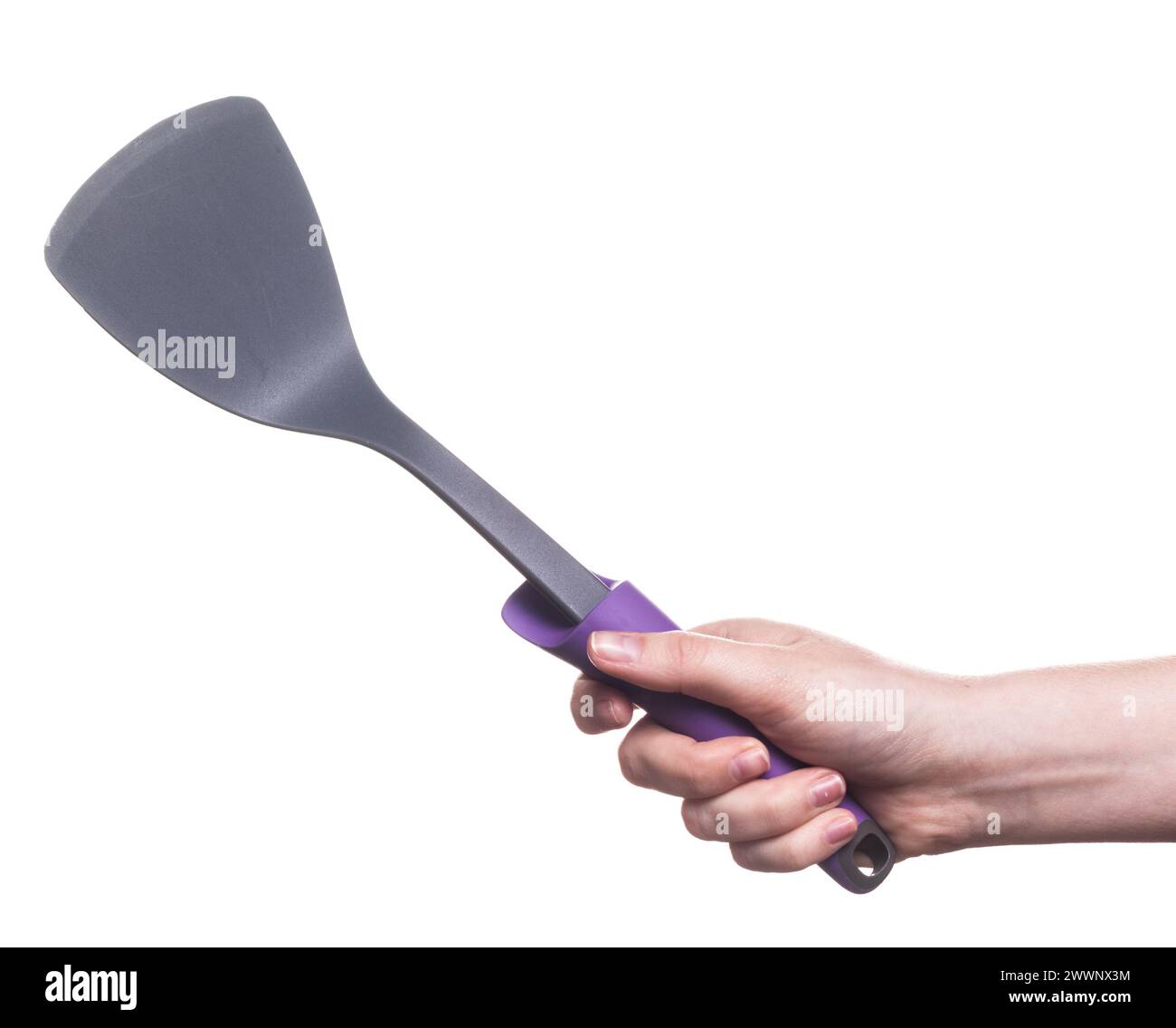 kitchen utensils in the hand of women isolated on white background ...