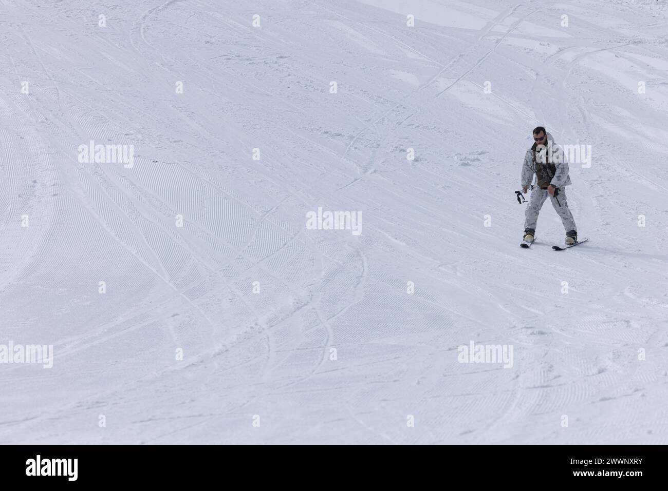 U.S. Marine Corps GySgt. Matthew Mahoney practices turning on skis ...