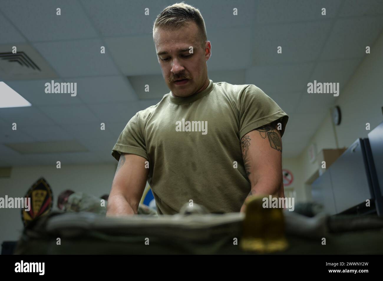 U.S. Air Force Airman 1st Class Marcus Kelley, aircrew flight equipment ...