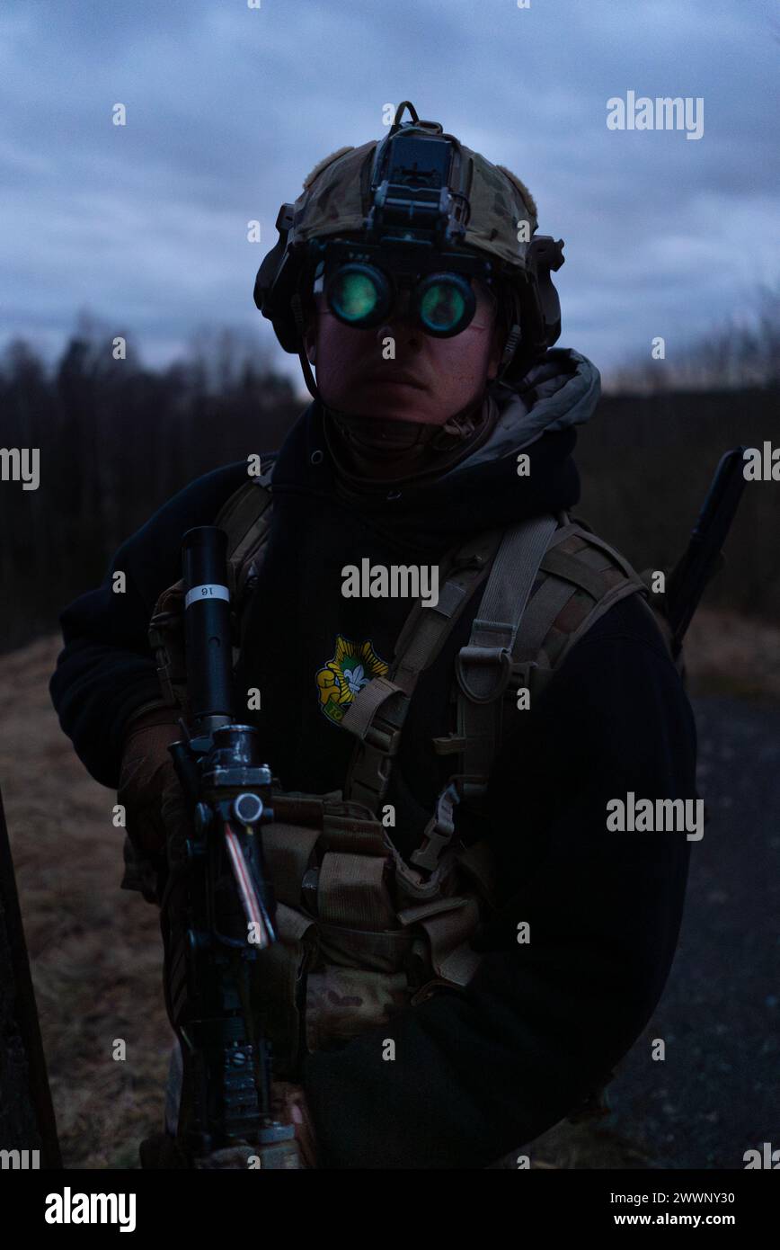 U.S. Army Sgt. William Peters, assigned to the 2nd Cavalry Regiment ...