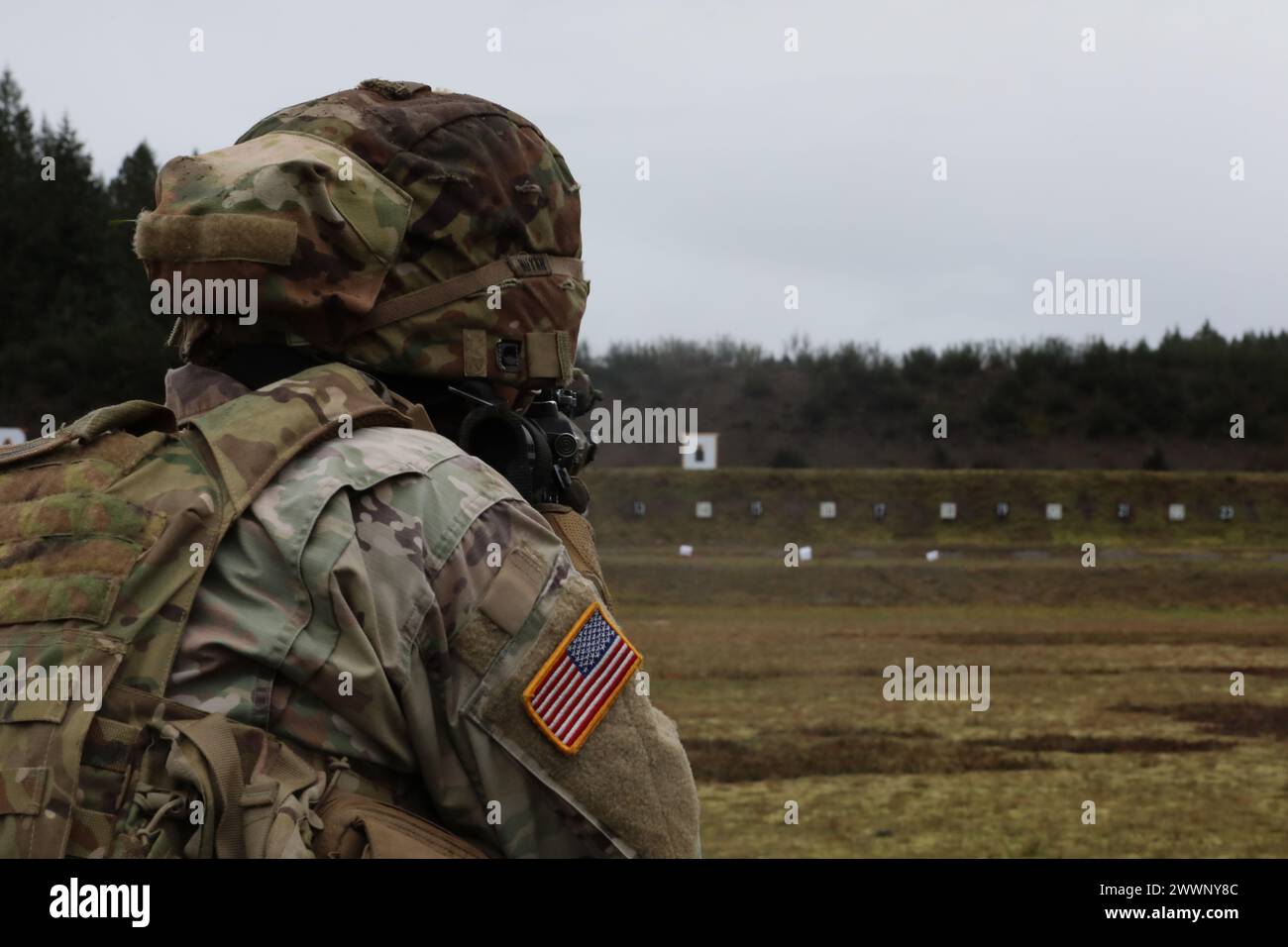 Sgt. Cuong Hyunh, attached to 7th Infantry Division, shoots at a target ...