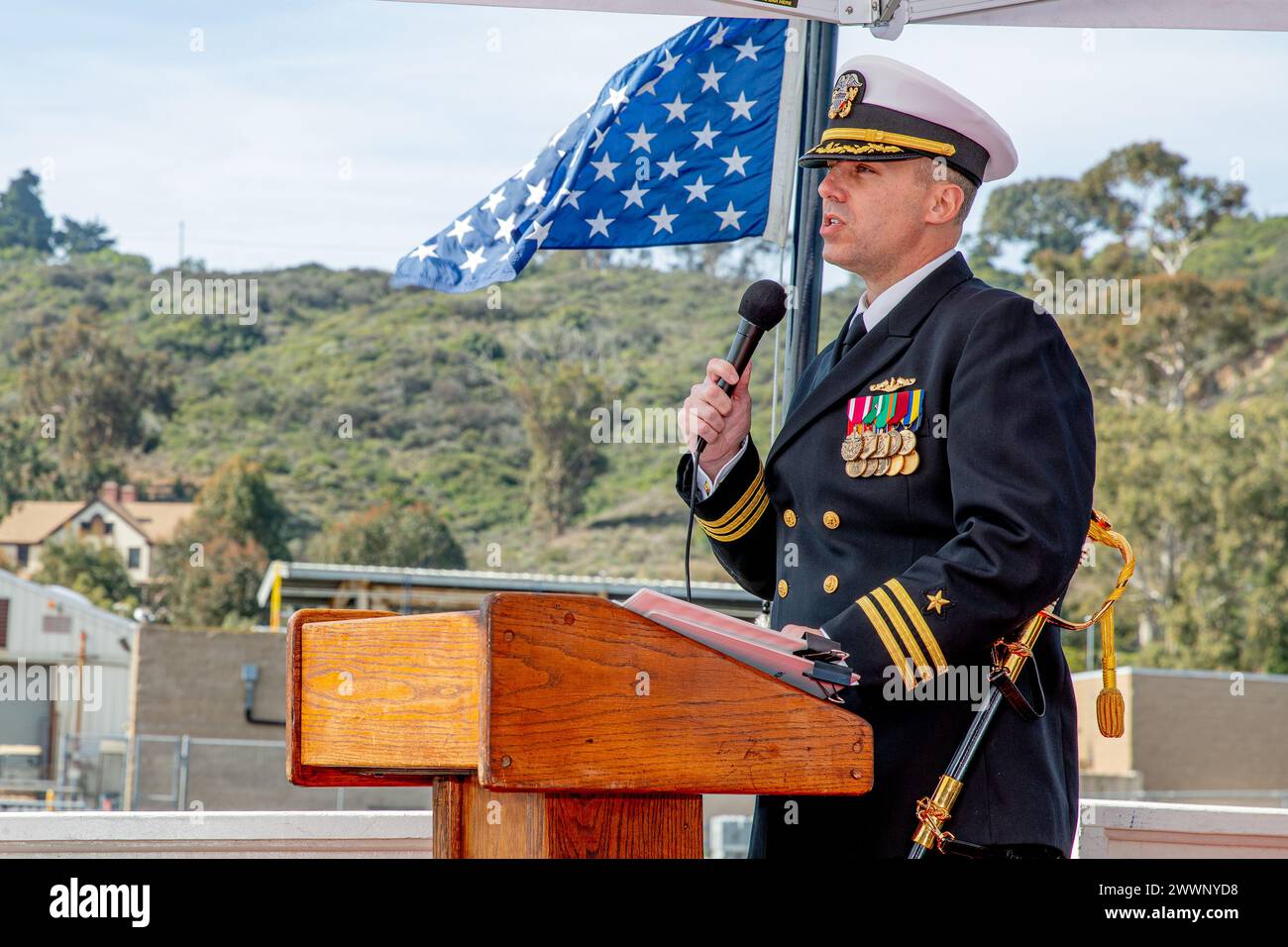 240216-N-SS900-1073 SAN DIEGO (Feb. 16, 2024) Cmdr. Eric Knepper speaks ...