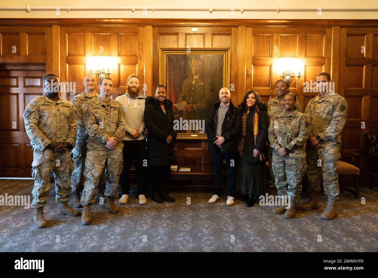 Officers with the 369th Sustainment Brigade meet with members of ...