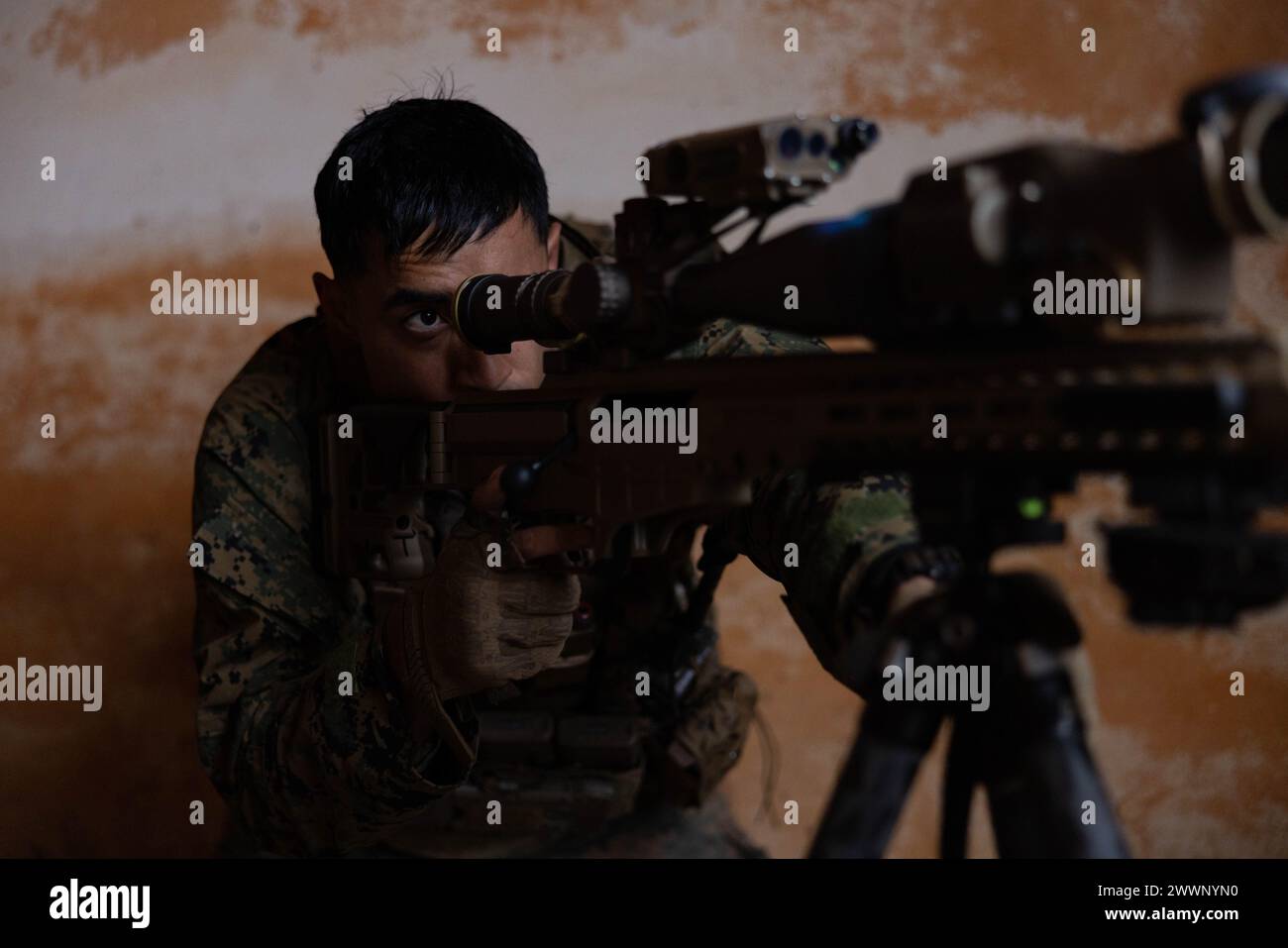 U.S. Marine Corps Sgt. Ryan Jamal-Panuelo, a scout sniper with the 26th ...