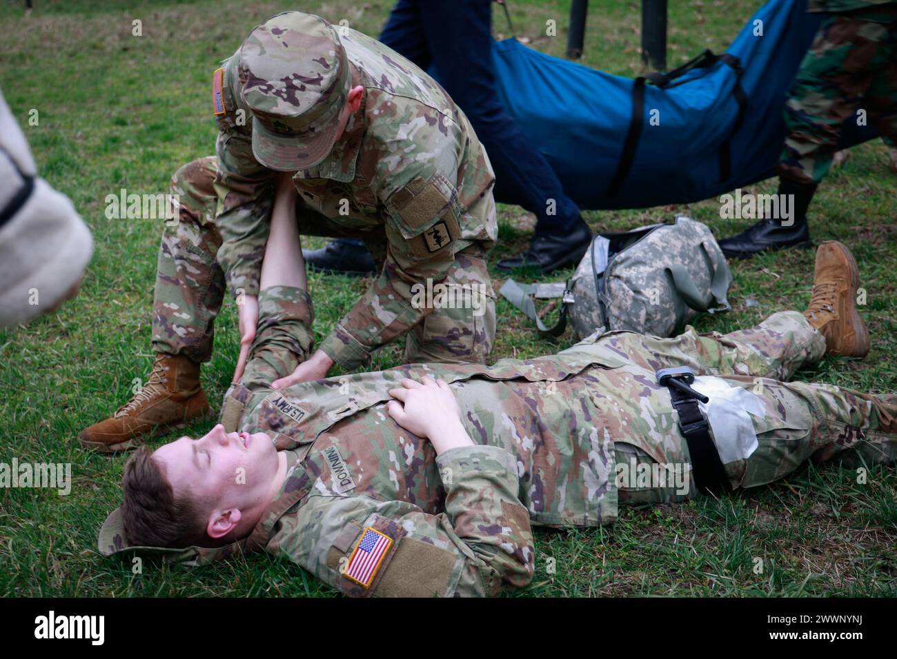 U.S. Army Sgt. Trevor Ball, combat medic, 30th Medical Brigade, does a ...