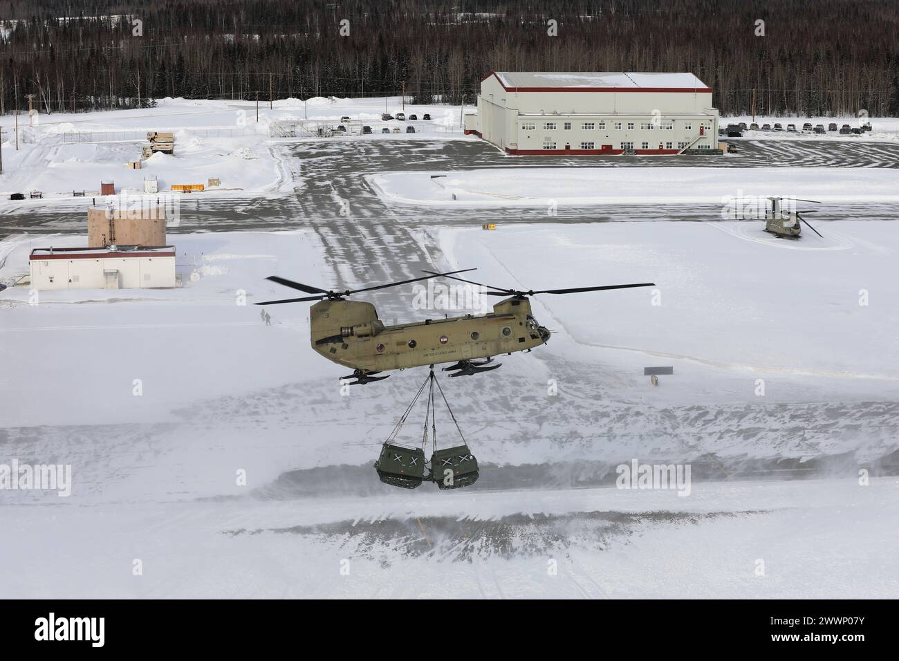 An Alaska Army National Guard CH-47F Chinook helicopter lifts a Small ...