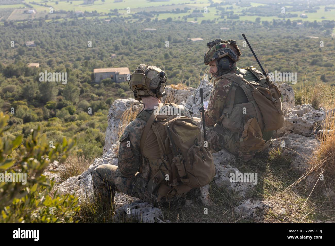 U.S. Marine Corps Sgt. John Cox, left, a joint terminal air controller ...