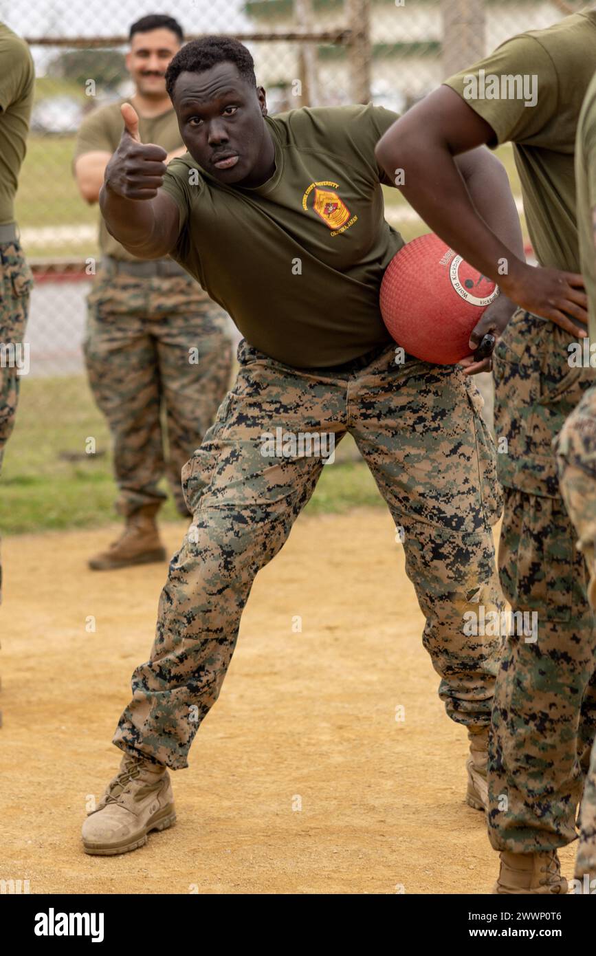 A U.S. Marine with Marine Air Control Group (MACG) 18, plays kickball ...