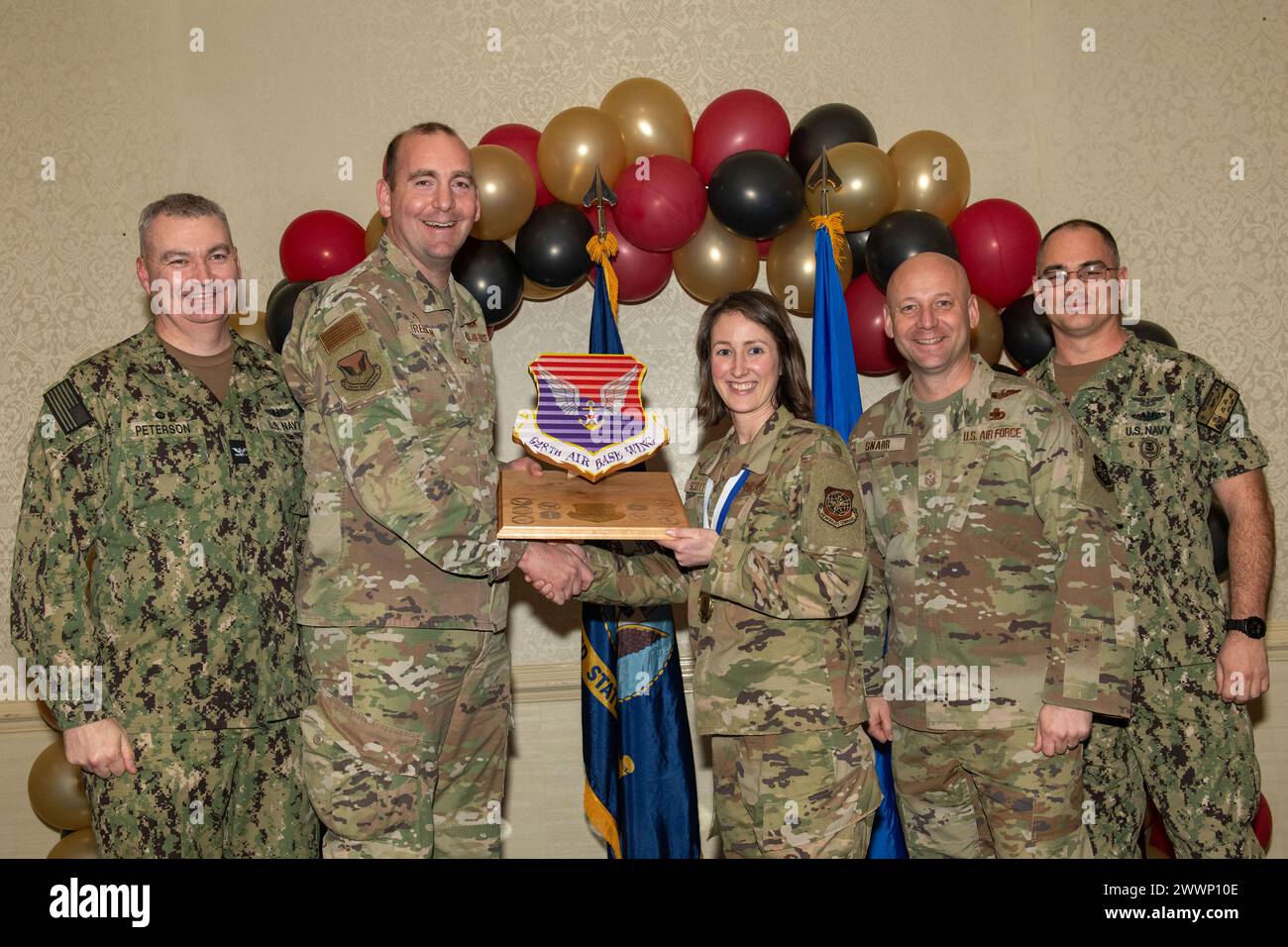 628th Air Base Wing annual award winners are presented with an award ...