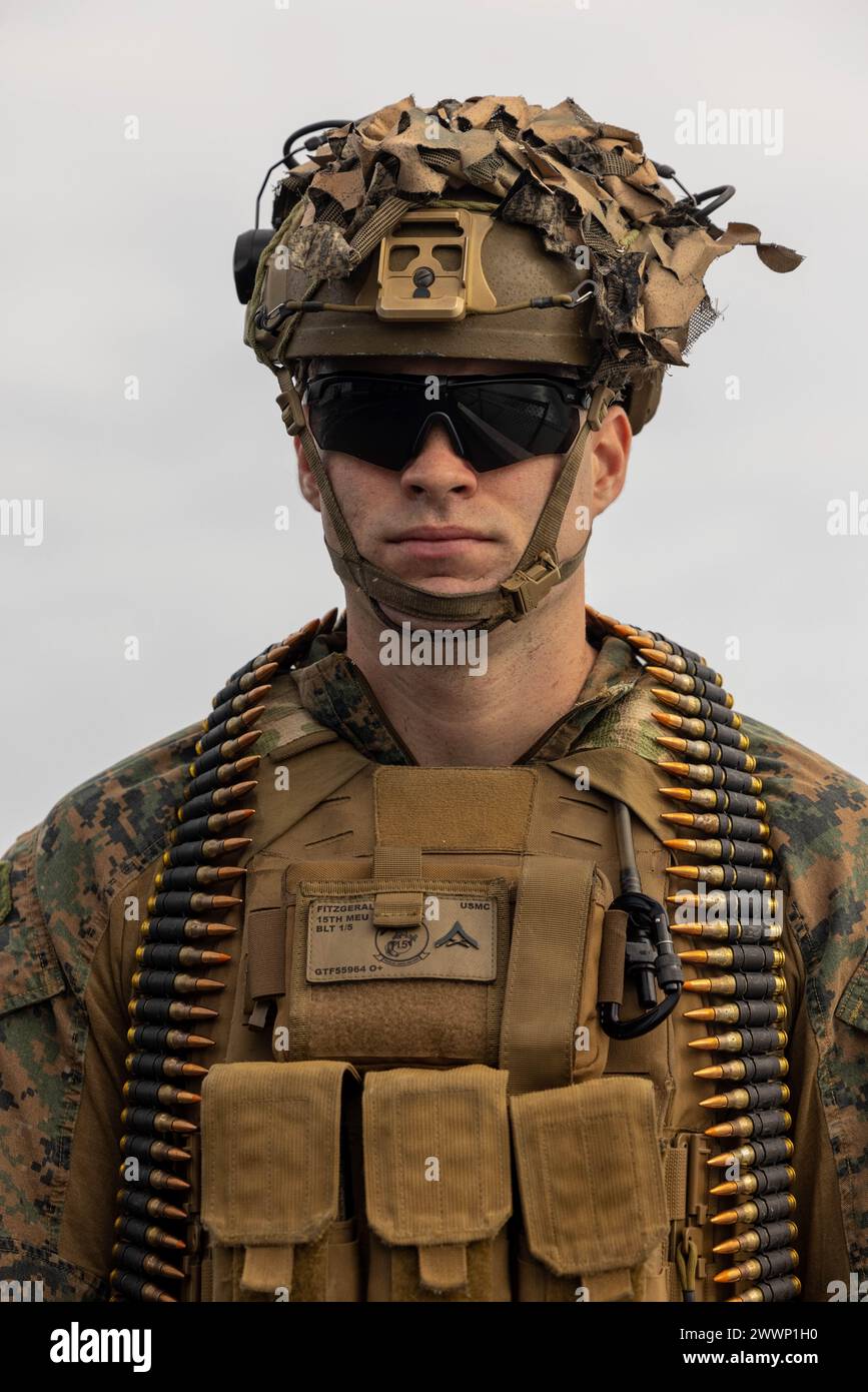 U.S. Marine Corps Lance Cpl. Ty Fitzgerald, a machine gunner assigned ...