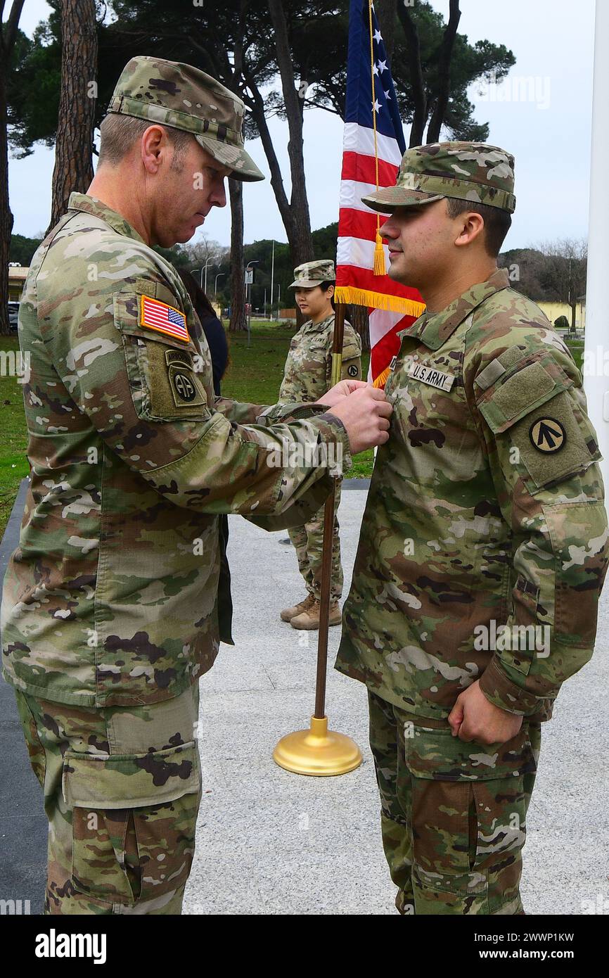 Left, U.S. Army Lt. Col. Michael S. Harrell commander of 839th Transportation Battalion applies ...