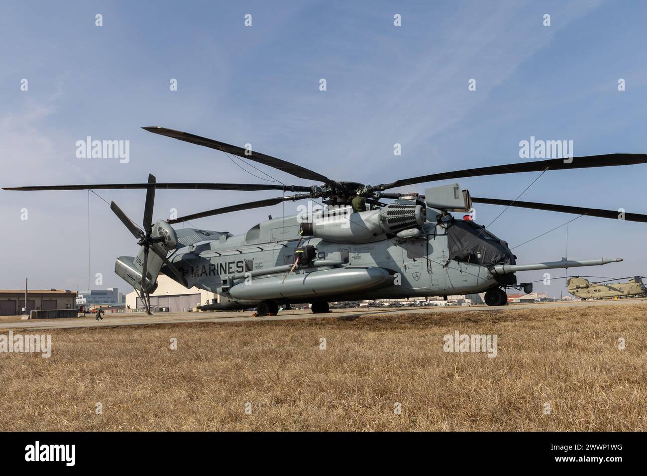 A U.S. Marine Corps CH-53E Super Stallion with Marine Heavy Helicopter Squadron (HMH) 466 ...