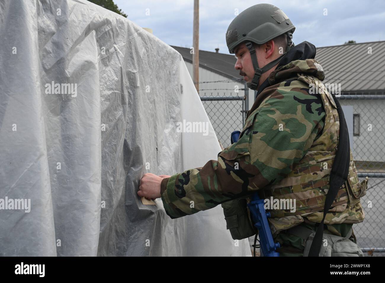 A Team Little Rock Airman applies M8 Chemical Detection Paper on an ...
