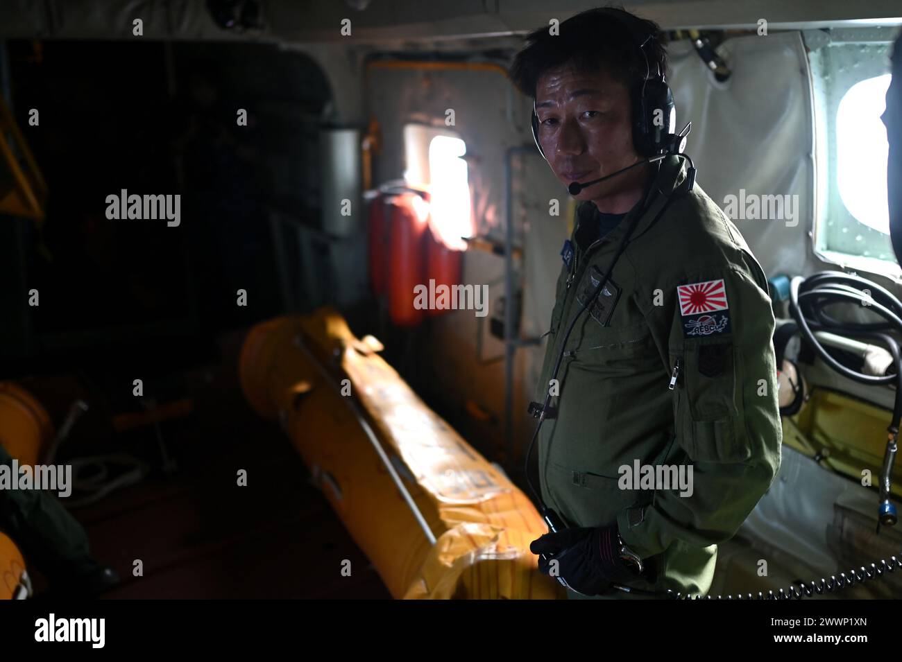 A Japan Maritime Self-Defense Force ShinMaywa US-2 Rescue Scuba team ...