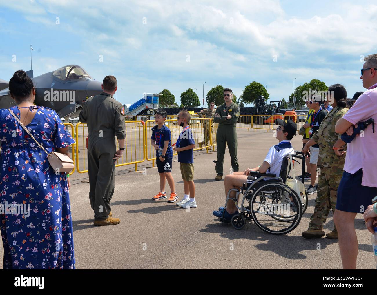 U.S. Air Force F-35A Lightning II pilots speak with children with the ...