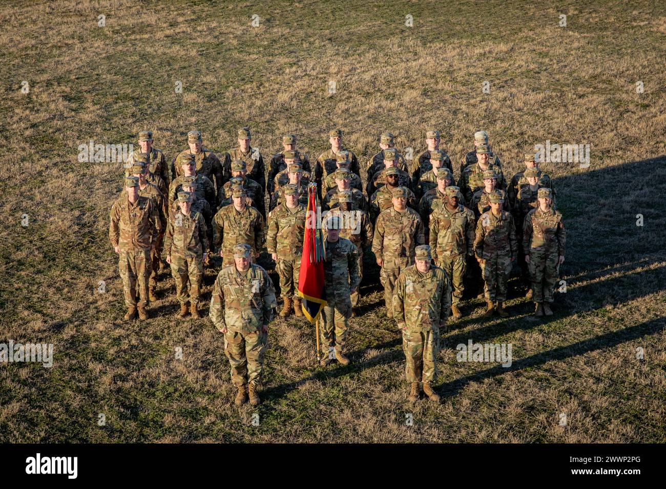 Soldiers with the 34th Infantry Division pose for a group photo while ...