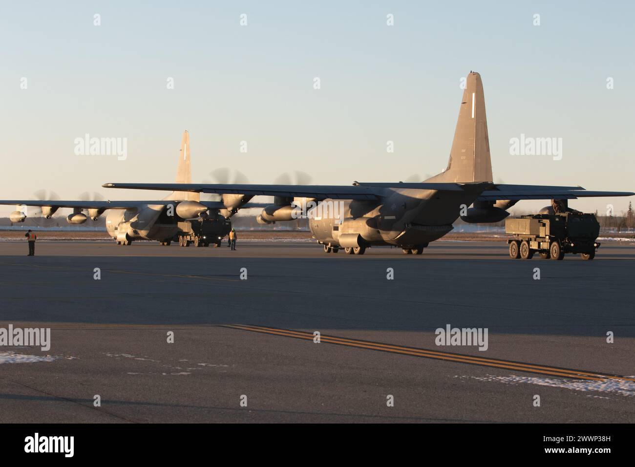 Two M142 High Mobility Artillery Rocket Systems (HIMARS) are unloaded ...