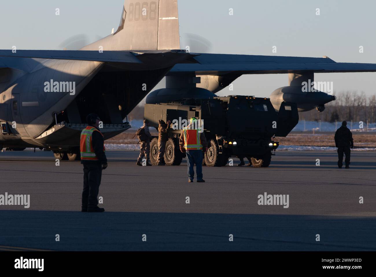 A M142 High Mobility Artillery Rocket System (HIMARS) is unloaded off ...