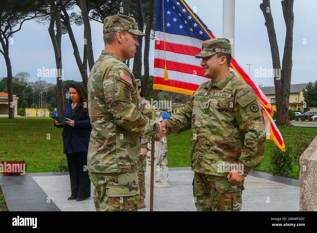 Left, U.S. Army Lt. Col. Michael S. Harrell commander of 839th Transportation Battalion greets ...