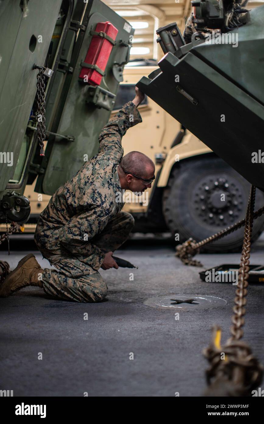 U.S. Marine Corps Cpl. Lucas Hough, a Light Armored Vehicle 25 gunner ...