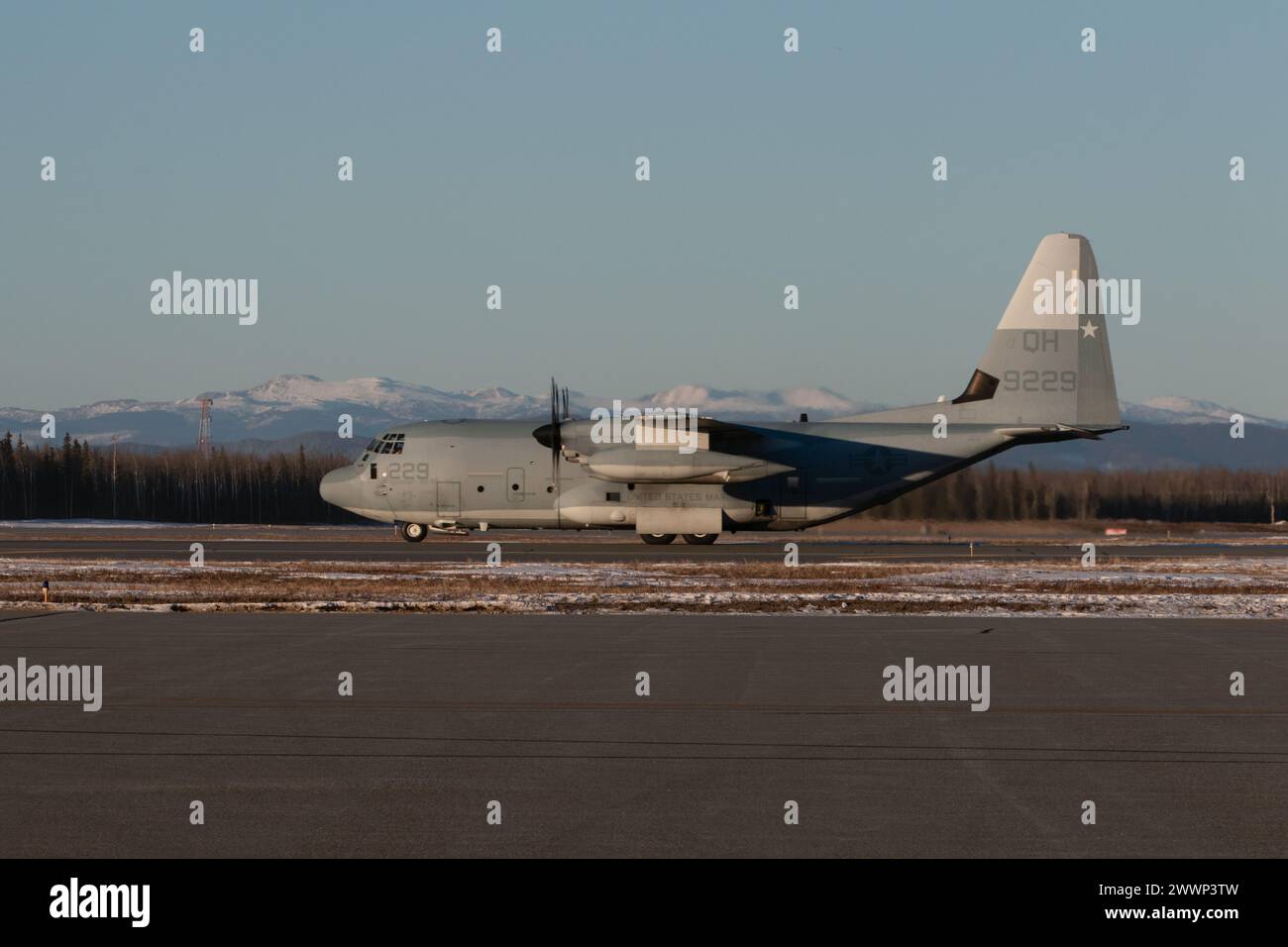 A C-130J Hercules, carrying a M142 High Mobility Artillery Rocket ...