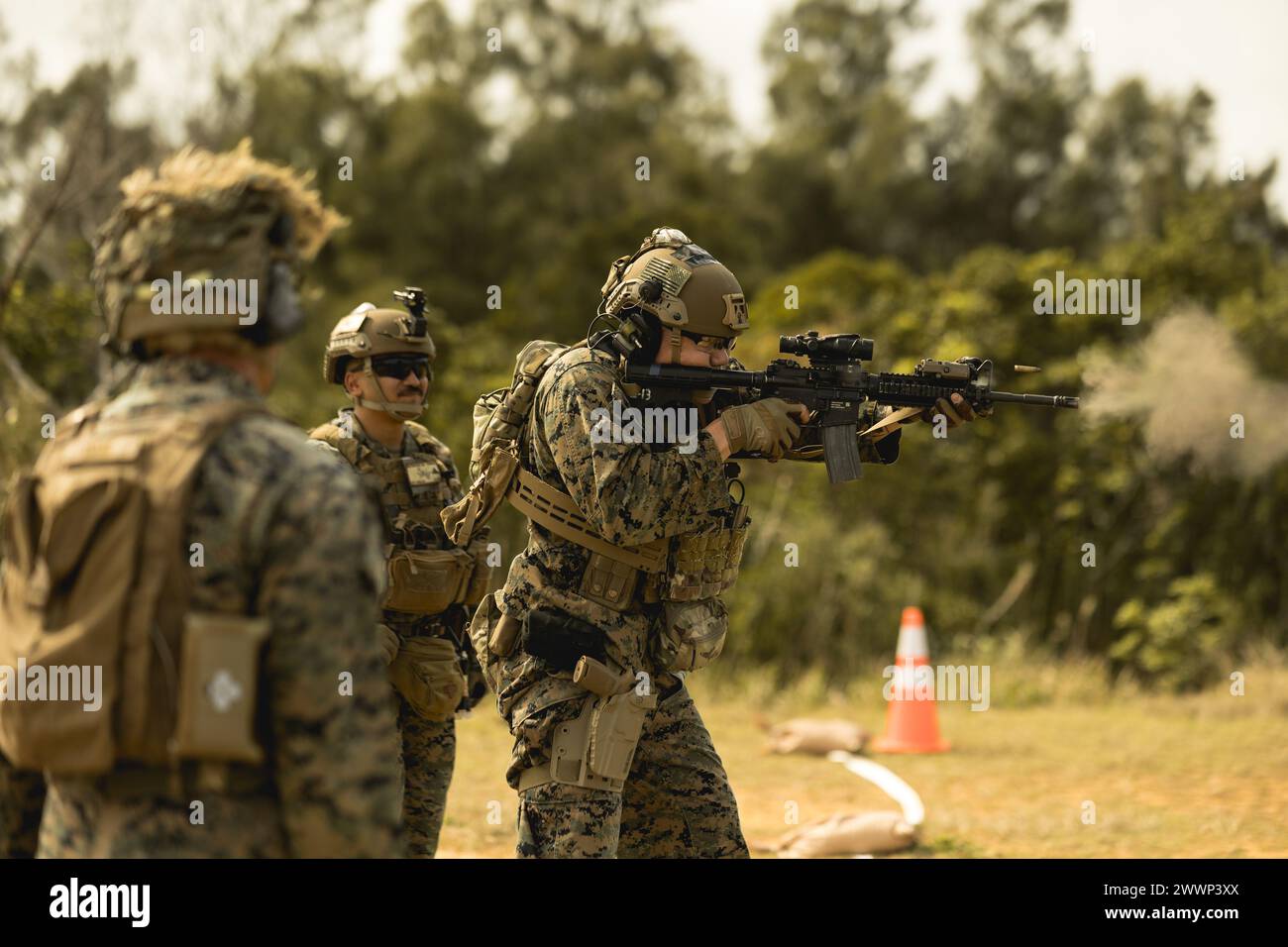 U.S. Marine Corps Staff Sgt. Sung Shin, right, a fires and effects ...