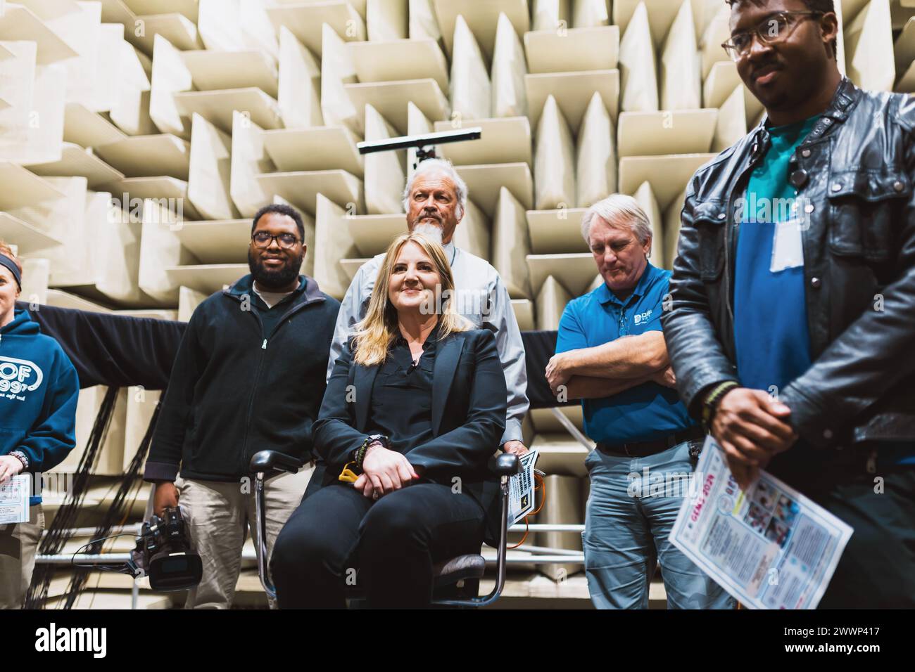 Sally Pitts, WSFA-12 reporter, participates in an auditory experience ...