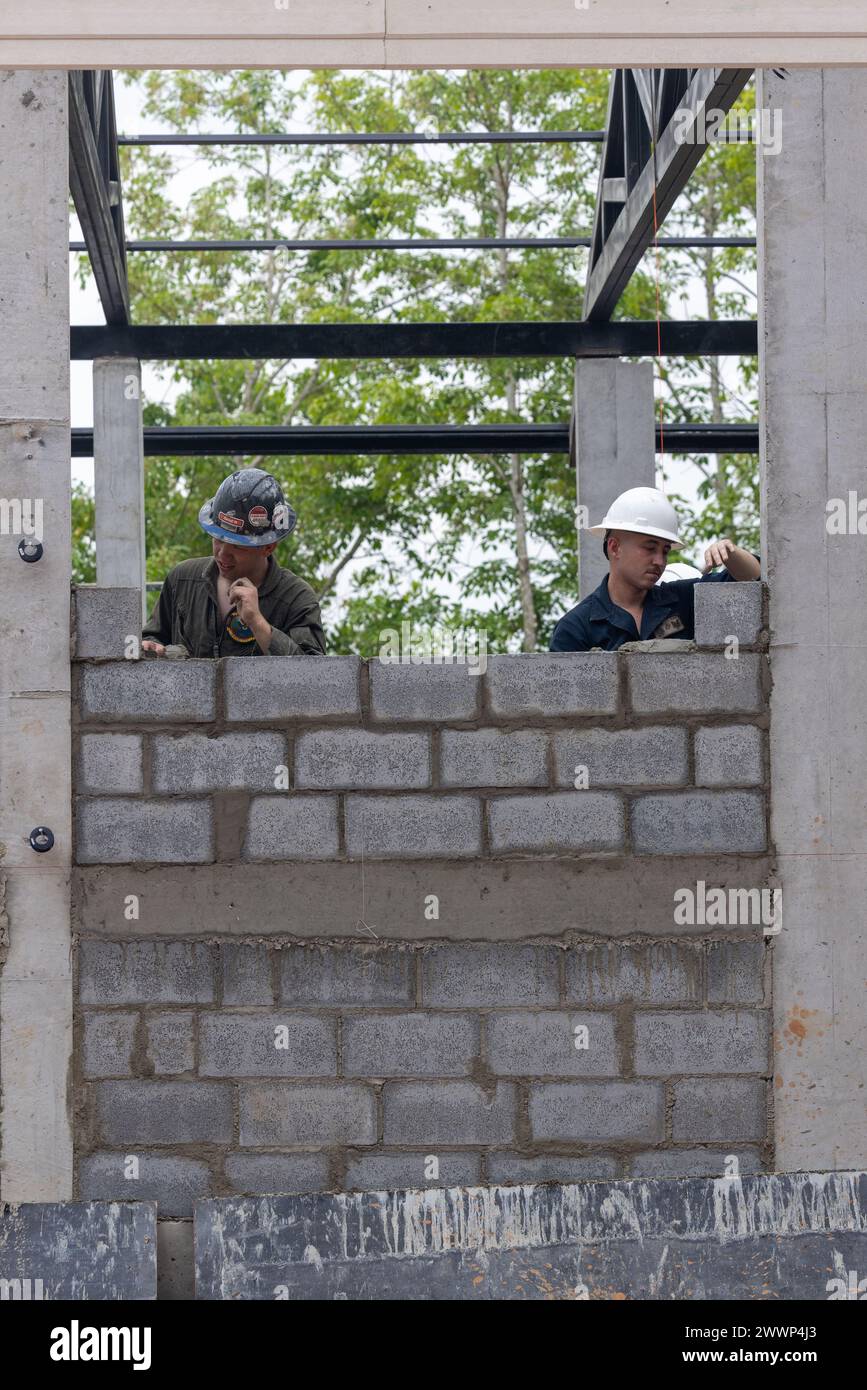 U.S. Marine Corps Lance Cpl. Keegan Frandsen, left, a heavy equipment ...