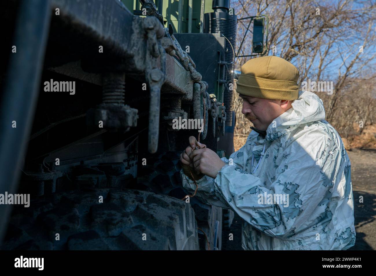 U.S. Marine Corps Cpl. Walker Plesko, a water support technician with ...