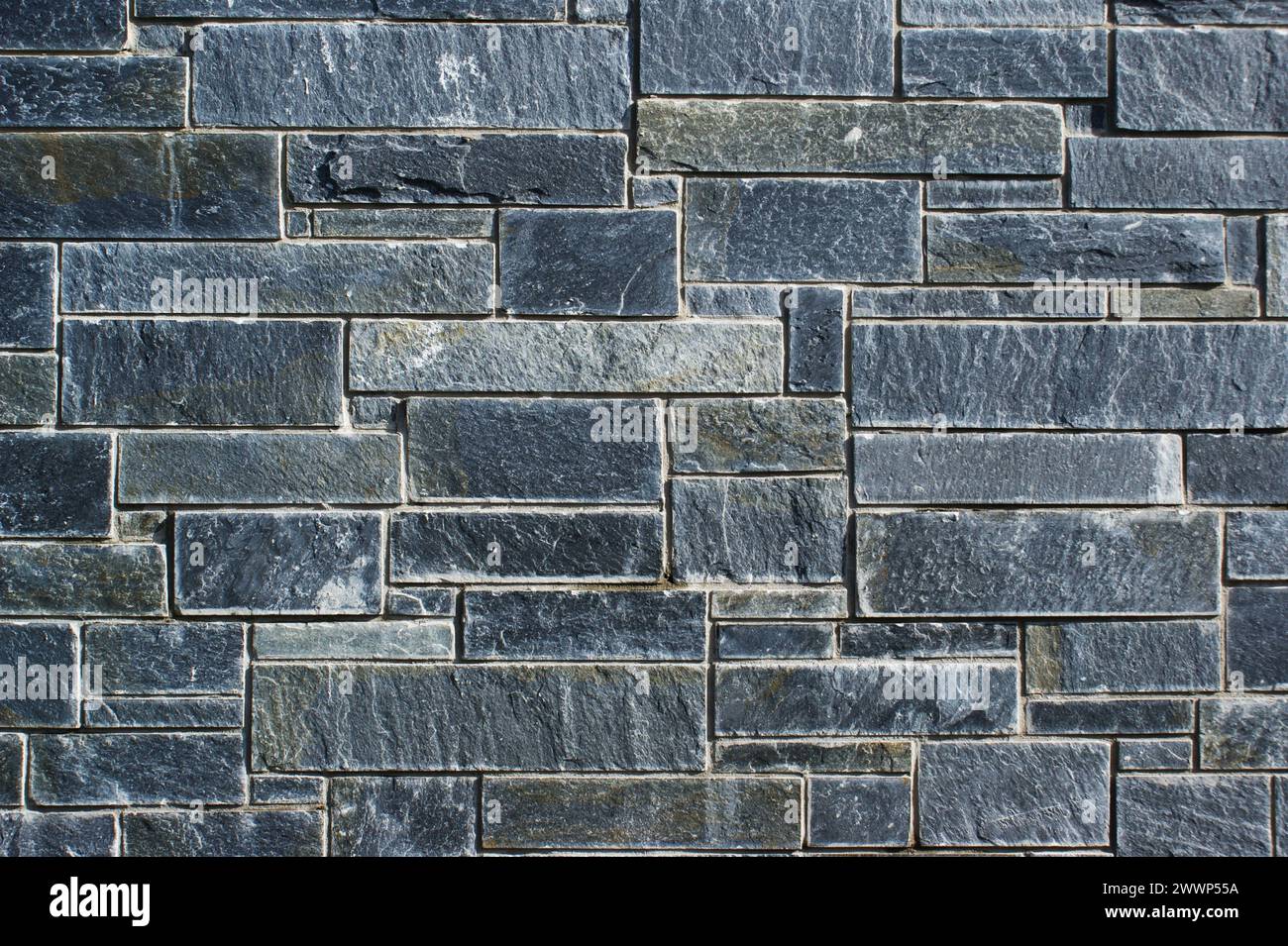 Gray decorative rough stone slab wall. Background texture Stock Photo ...