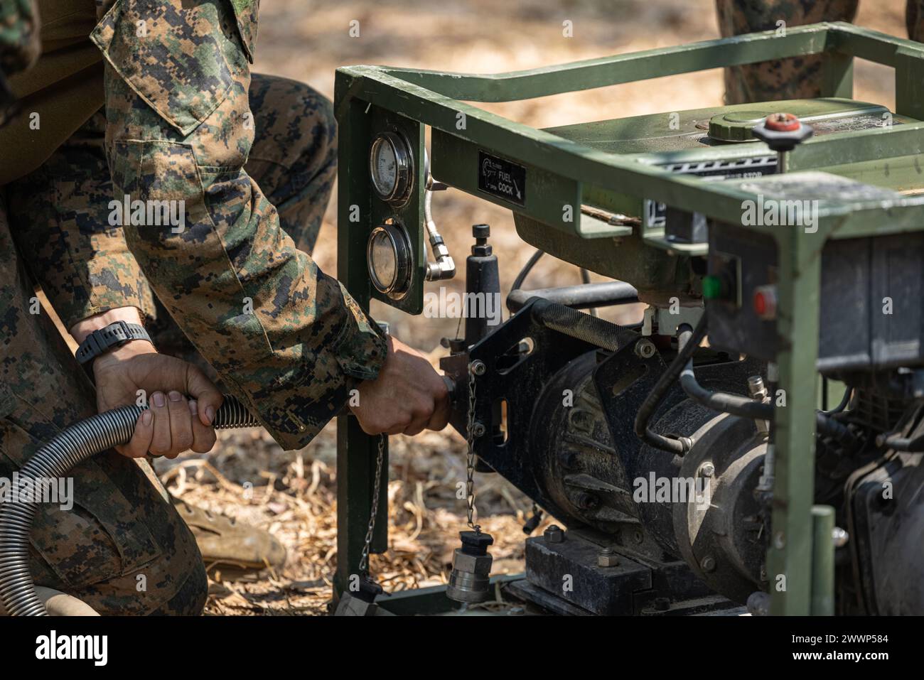A U.S. Marine assigned to Combat Logistics Battalion 15, 15th Marine ...