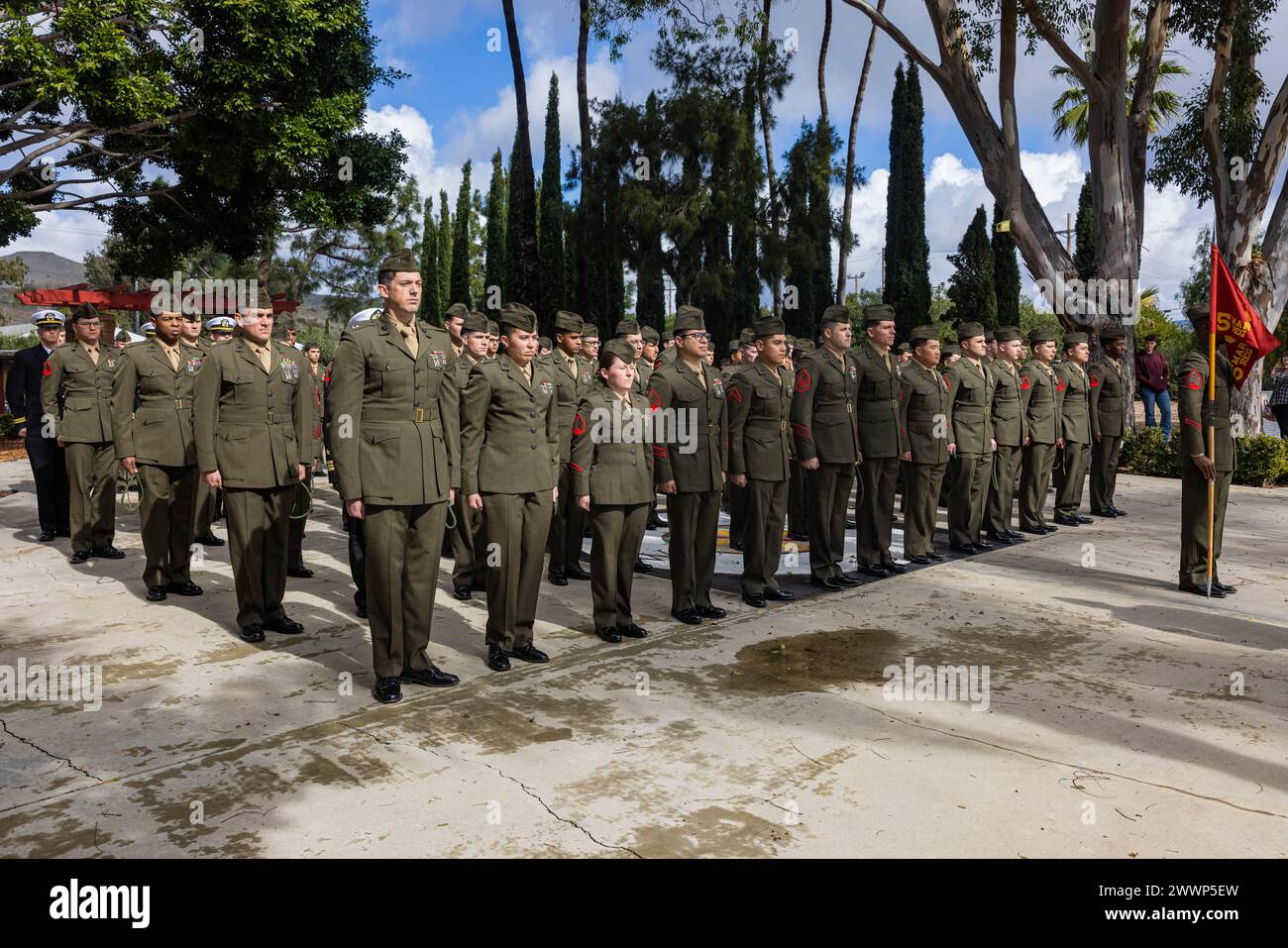U.S. Marines with 5th Marine Regiment, 1st Marine Division, stand at ...