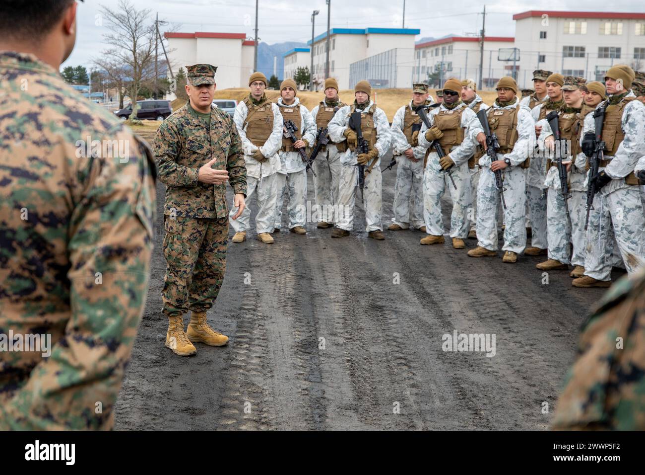 U.S. Marine Corps Brigadier General Adam Chalkley, left, the commanding ...