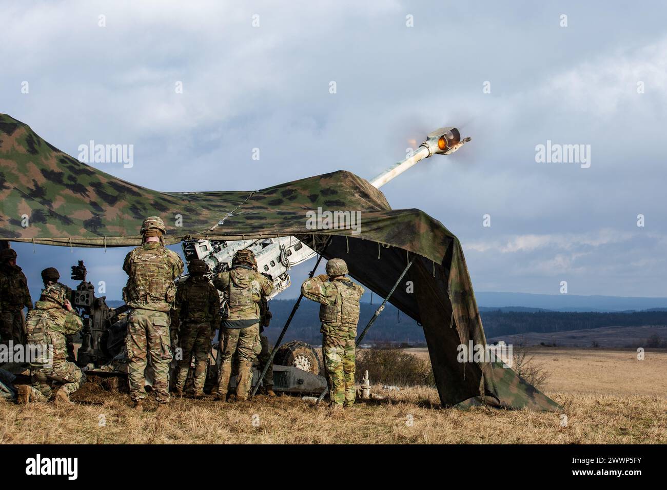 U.S. Soldiers, assigned to the 2nd Cavalry Regiment, 3rd Squadron, fire ...