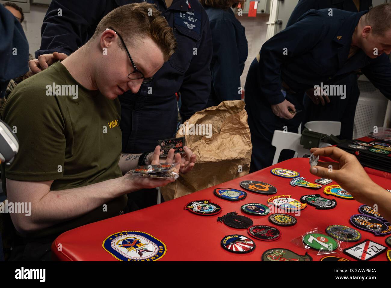 U.S. Navy culinary specialist 3rd class Justin Walker, with the ...