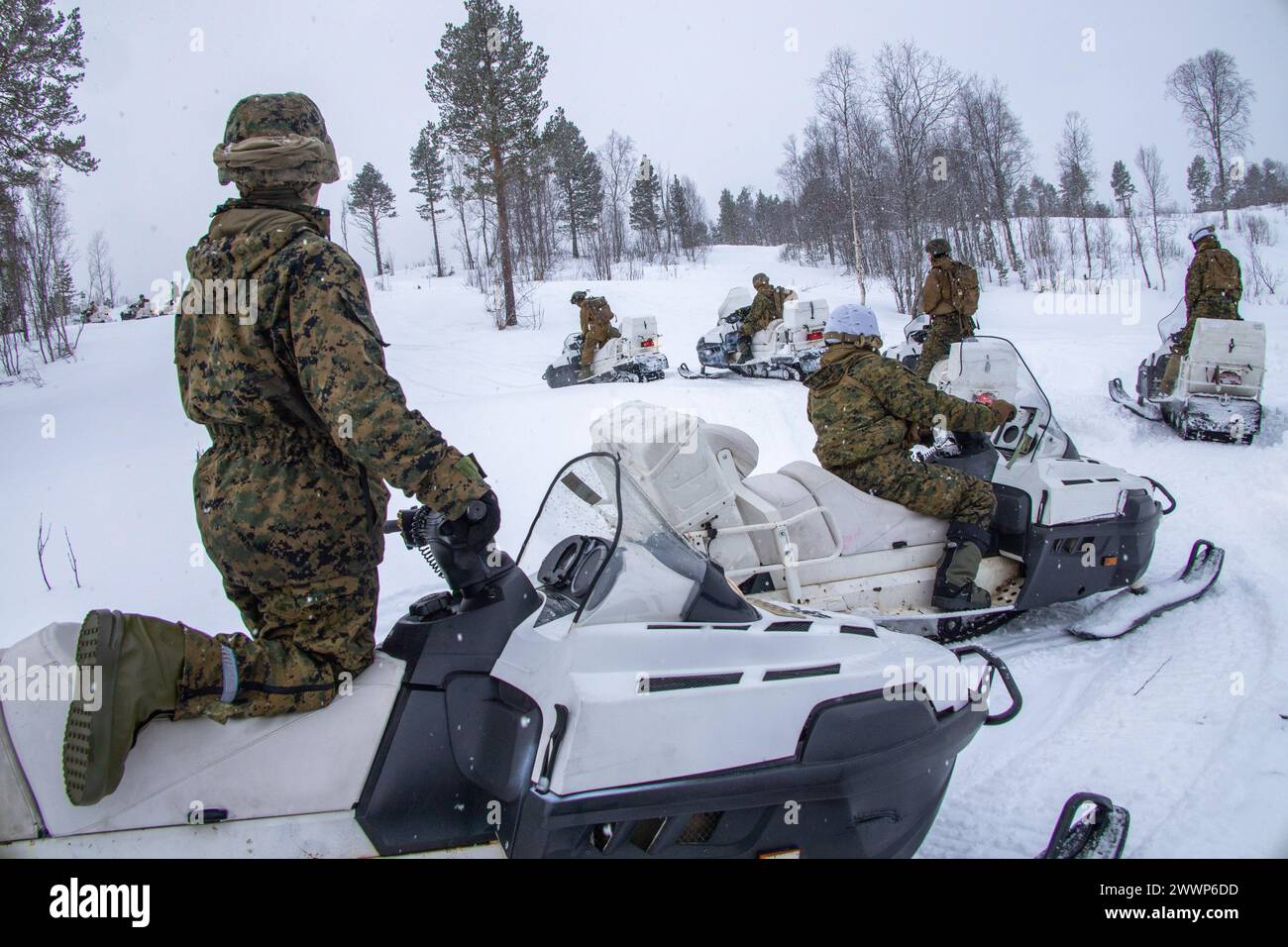 U.S. Marines with II Marine Expeditionary Force navigate through a ...