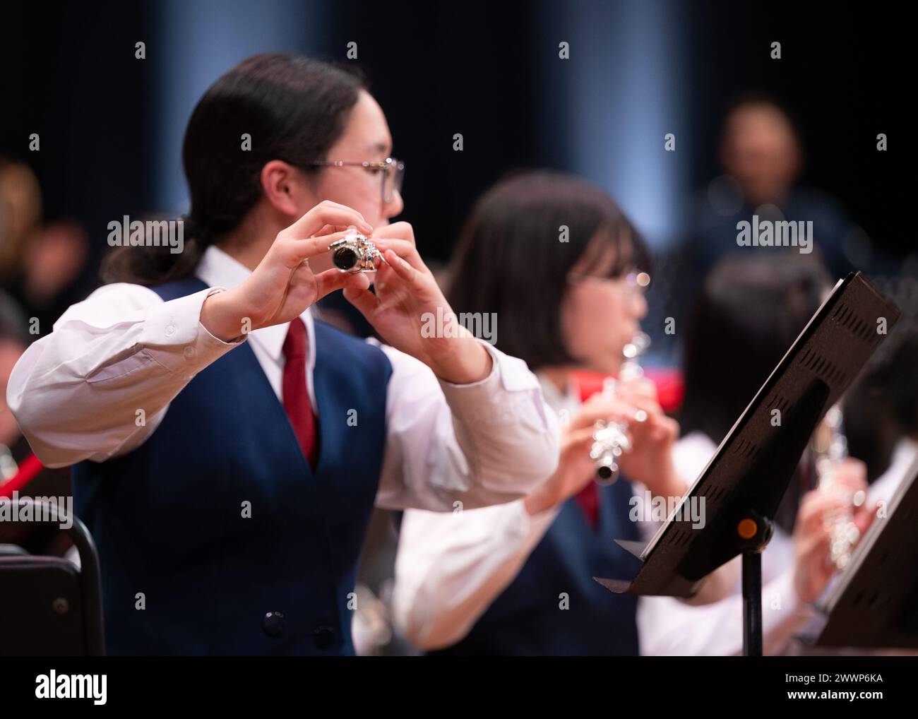 A student from Akishima City Haijima Jr. High School Wind Ensemble ...