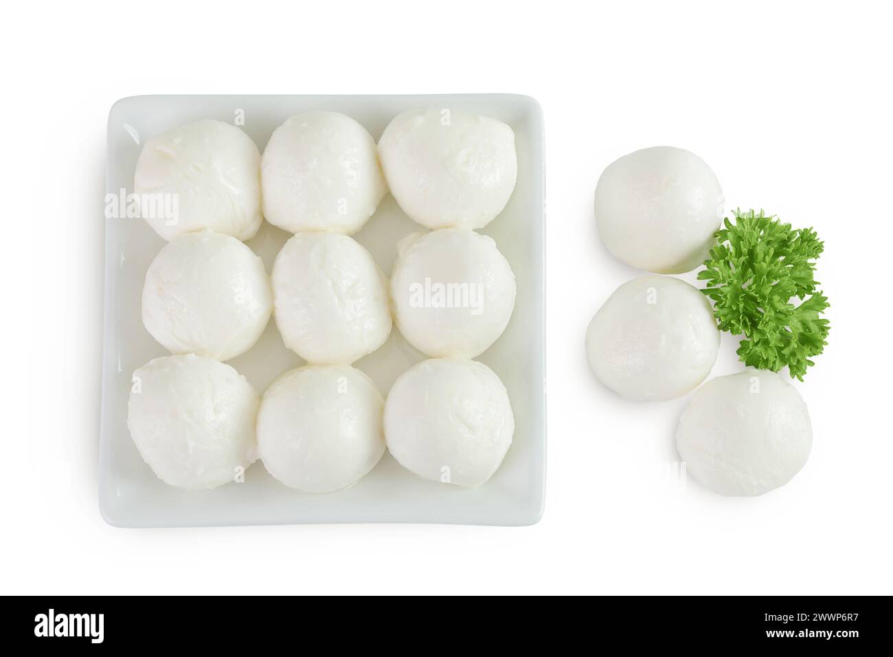 Mini mozzarella balls with parsley in a ceramic bowl isolated on white ...