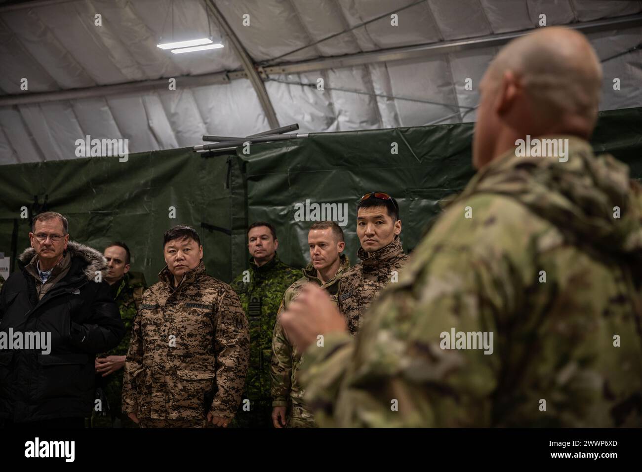 Distinguished visitors pay a visit to the 11th Airborne Division as part of Joint Pacific ...