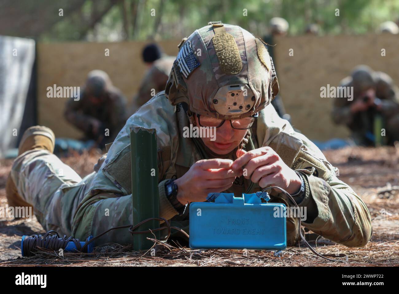 A U.S. Army soldier assigned to the 82nd Airborne Division places an ...