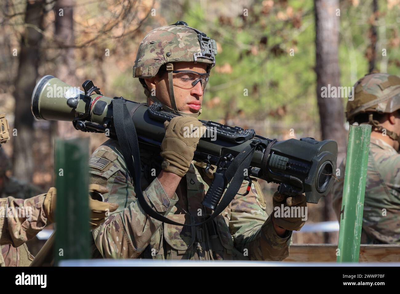 A U.S. Army soldier assigned to the 82nd Airborne Division shoulders an ...